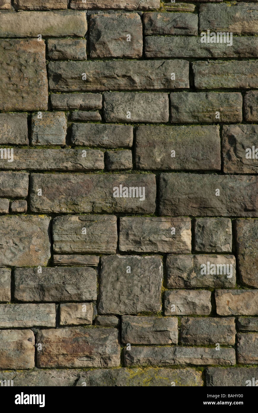A wall made of natural stone bricks Stock Photo - Alamy