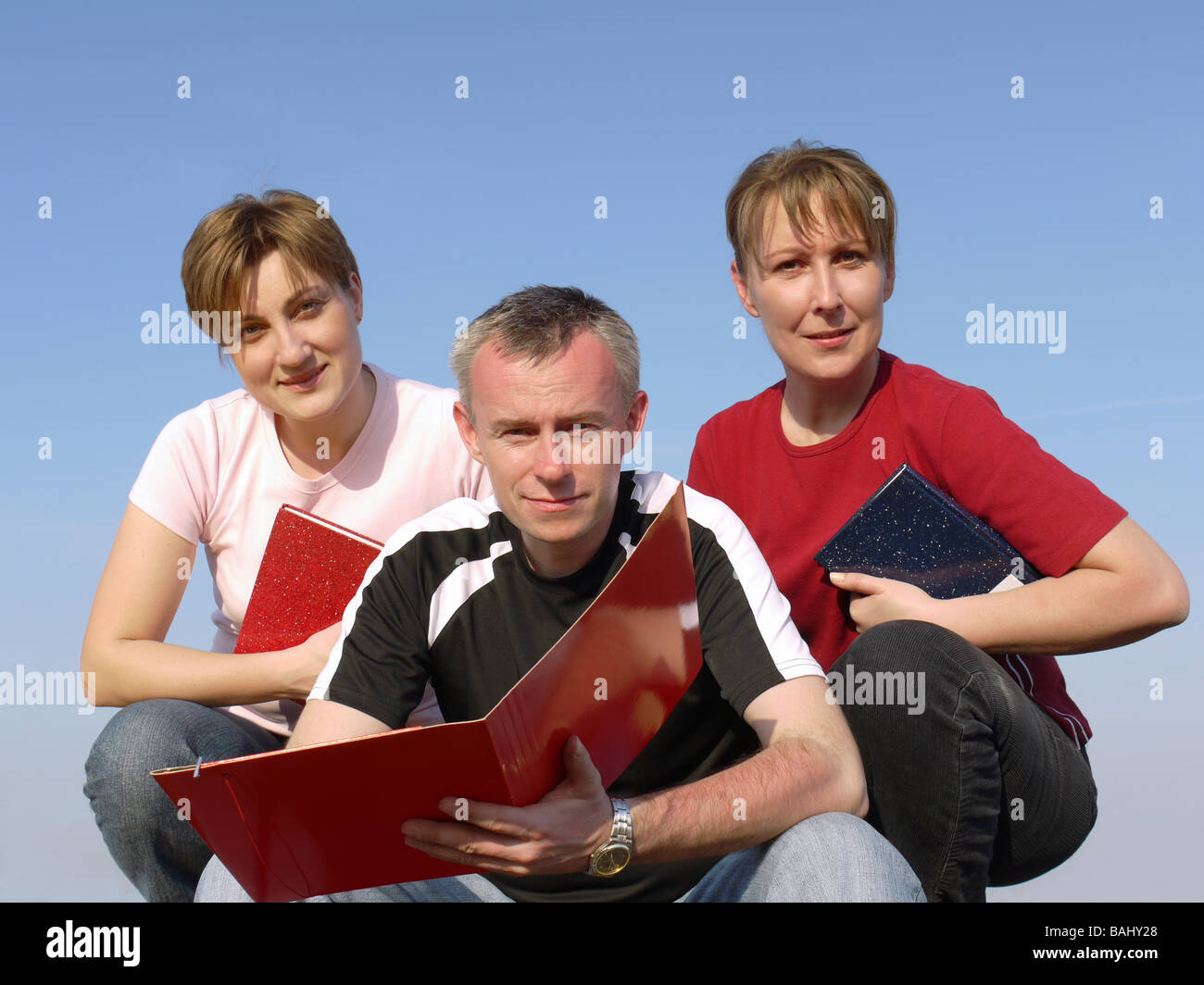 Three students hi-res stock photography and images - Alamy