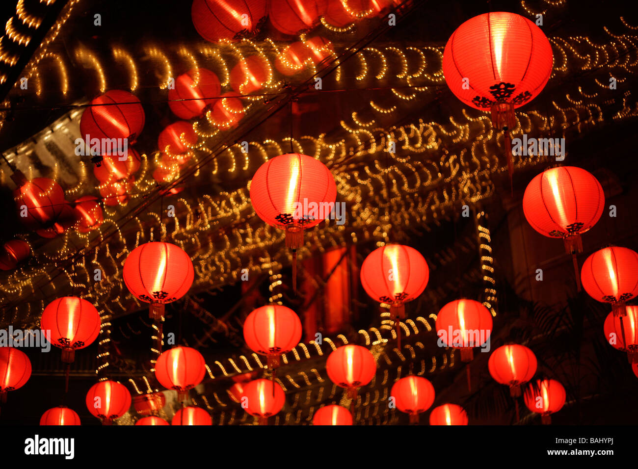 Chinese red lanterns glowing in hi-res stock photography and images - Alamy