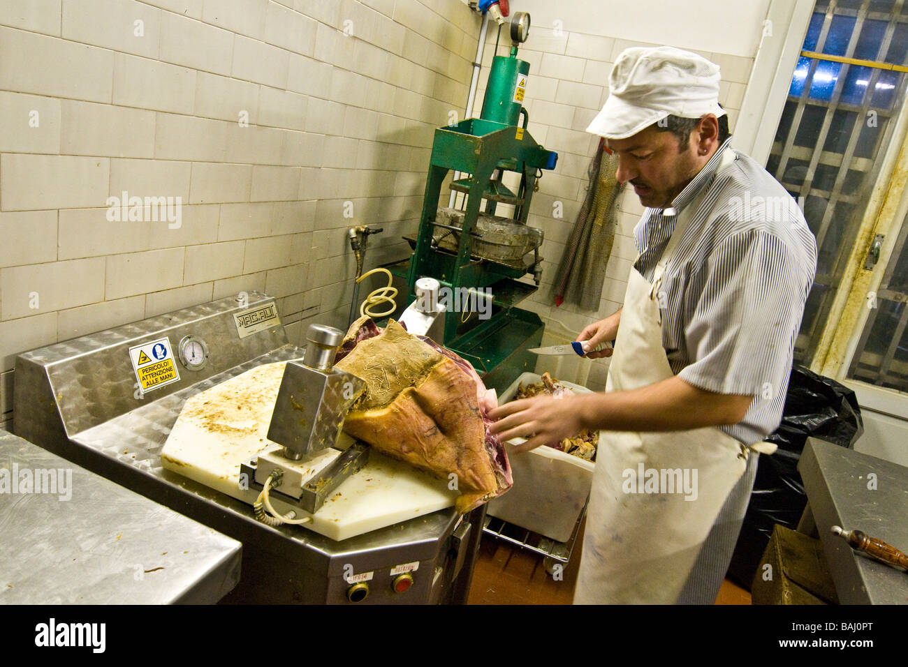 Ham of Modena Ham factory worker Italian ham factory by Nini Gianfranco ...