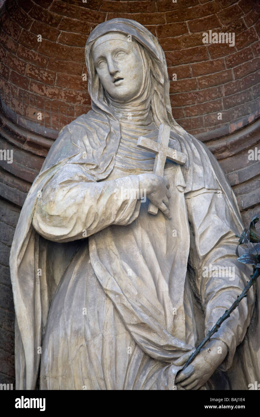 Religious statues in the strees of Siena, Tuscany, Italy Stock Photo ...