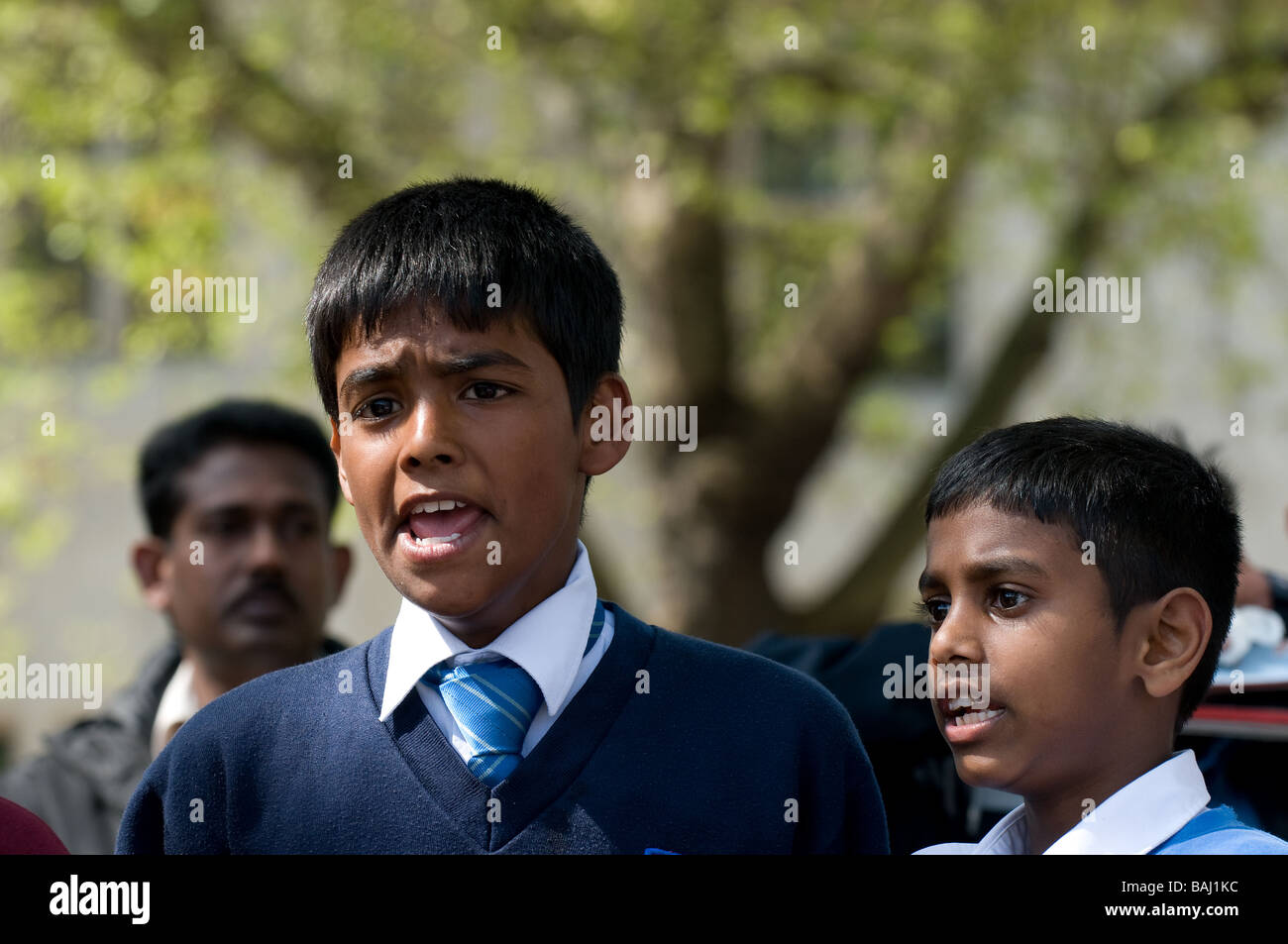 Children chanting hi-res stock photography and images - Alamy
