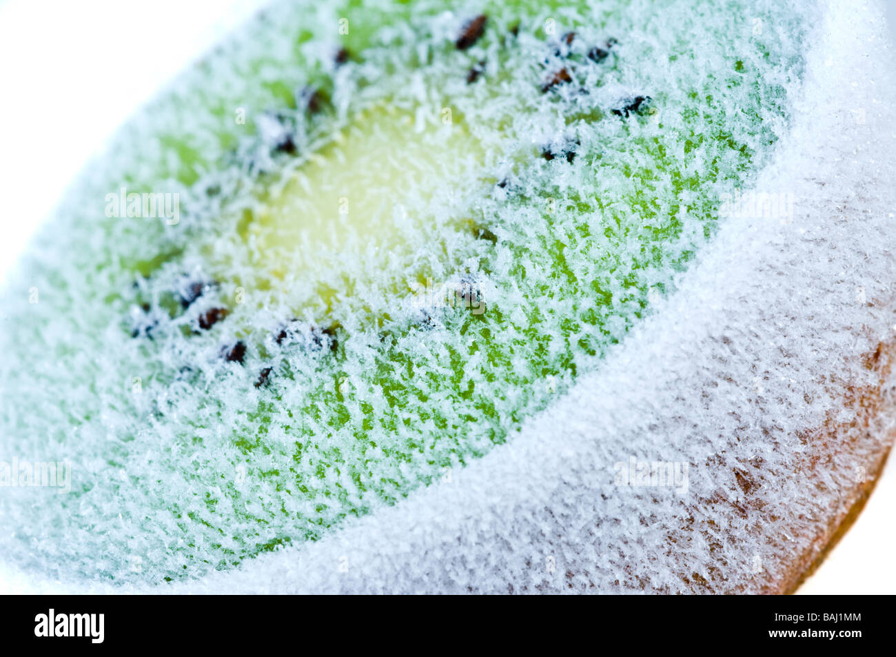 Slices frozen kiwi in ice Stock Photo - Alamy