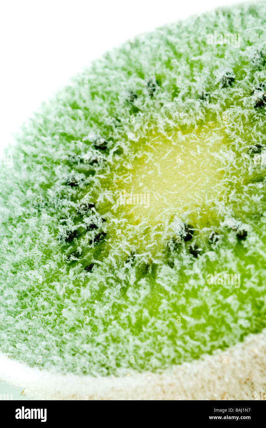 Slices frozen kiwi in ice Stock Photo - Alamy