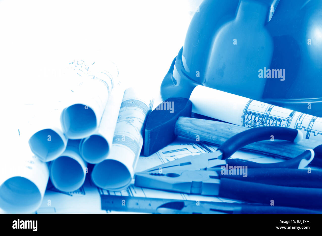 Working tools on a background of drawings Stock Photo - Alamy