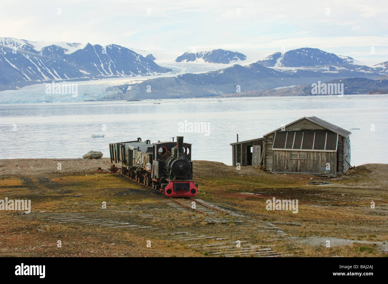 Old mining train at Ny Alesund scientific station settlement at present ...
