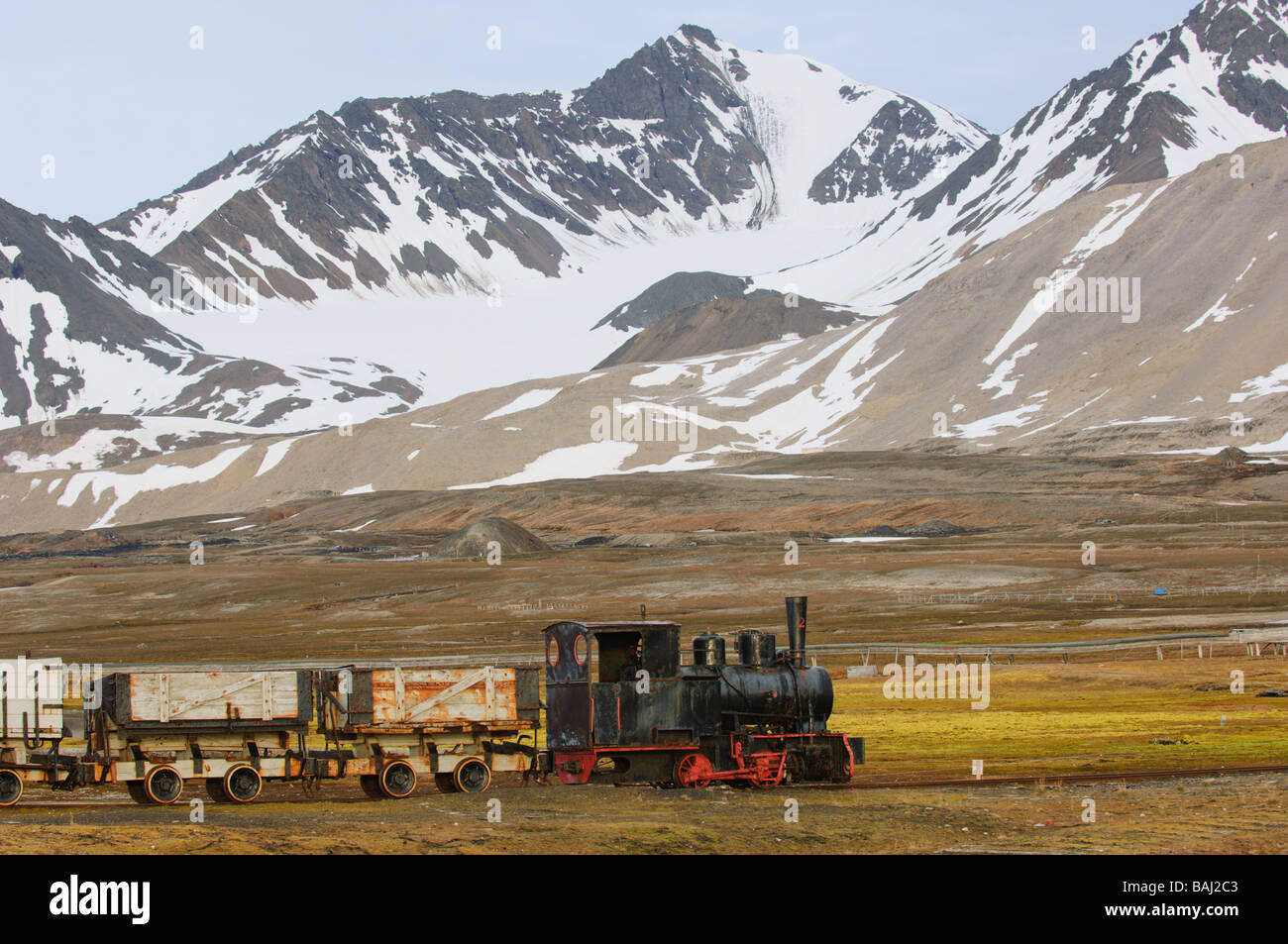 Old mining train at Ny Alesund scientific station settlement at present ...