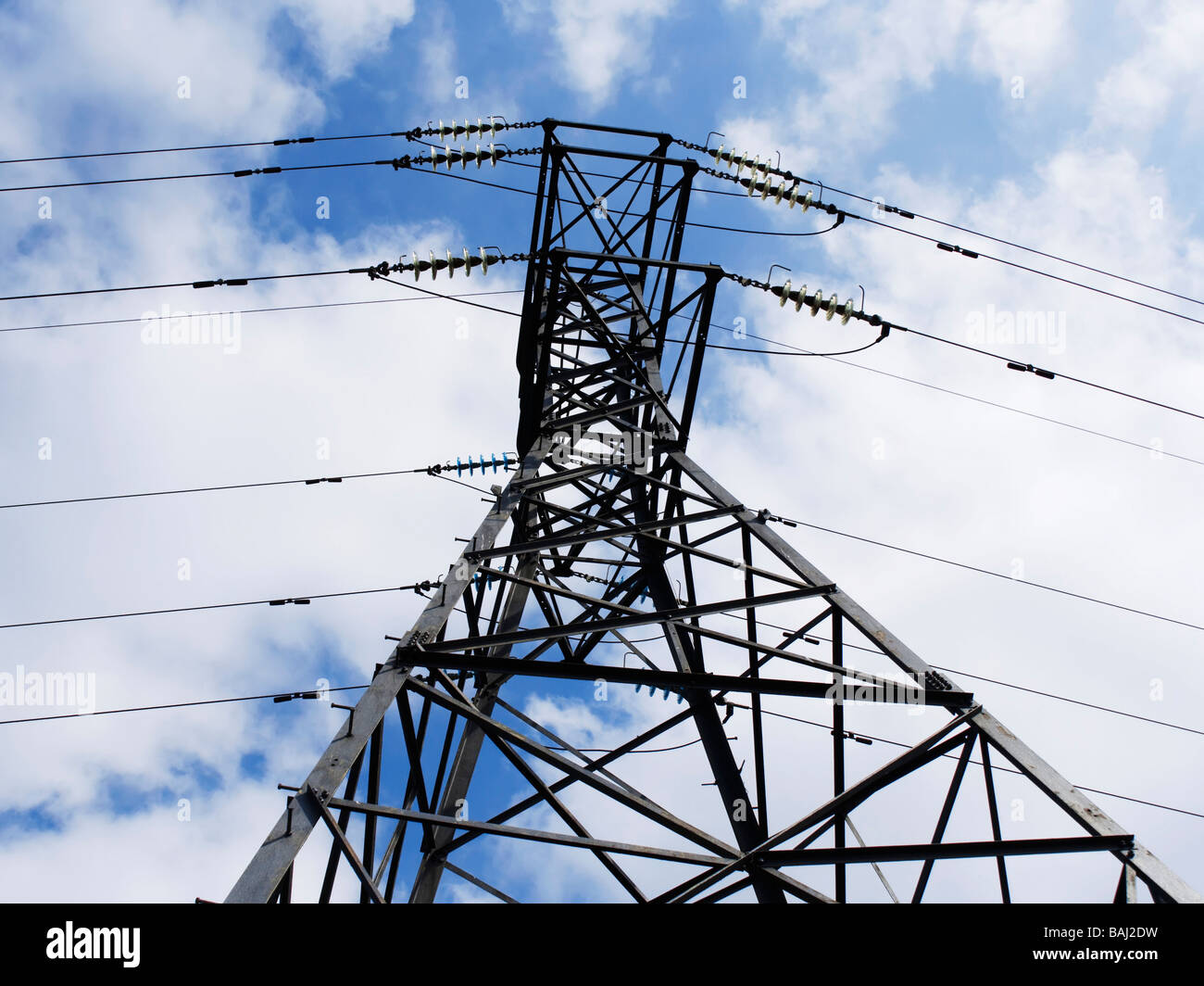 metal pylon carrying electricity supply power lines Stock Photo - Alamy