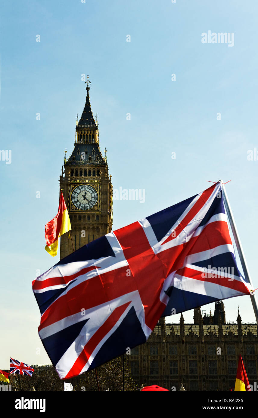 Flags held aloft in front of Big Ben in London. Photo by Gordon ...