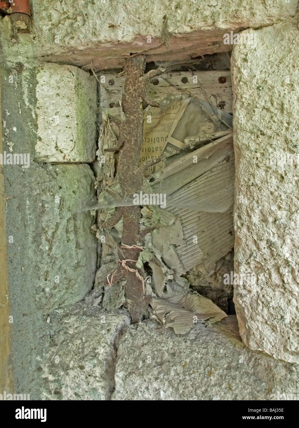 old house with jammed newspaper in the window in Finistere Brittany ...