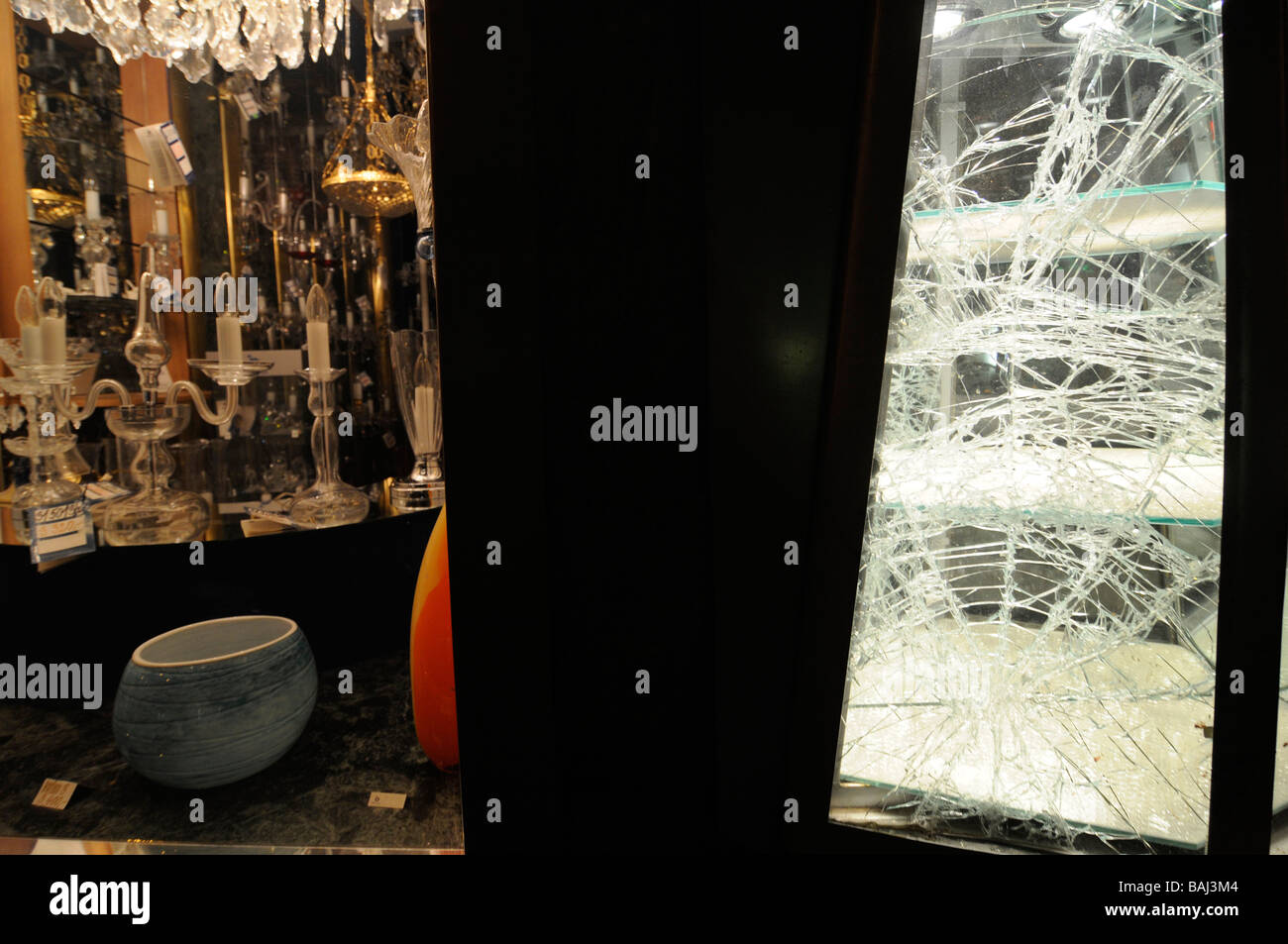 Broken burglary glass in the window of a jewelry shop was a theft was ...