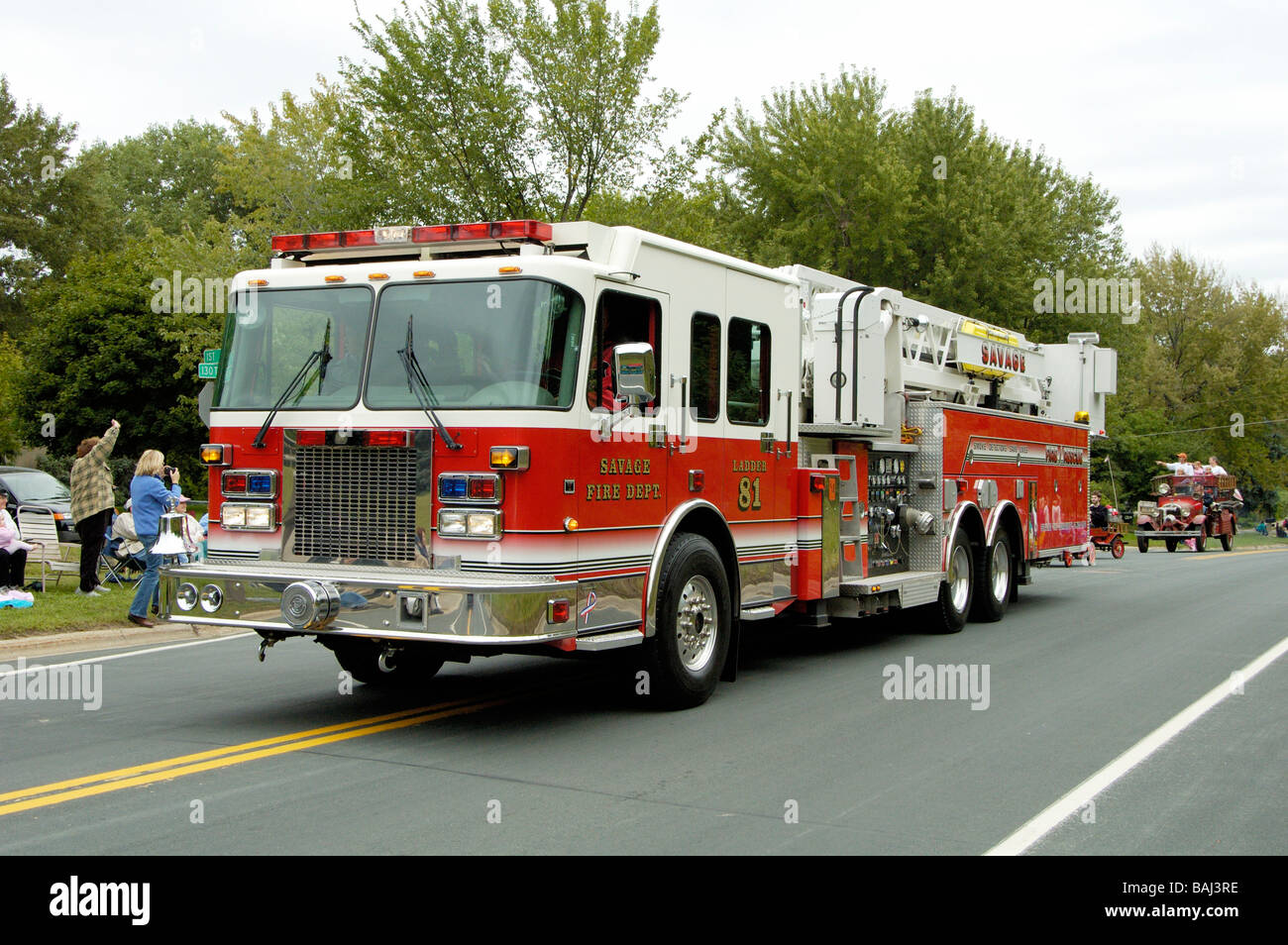 Fire department vehicles being driven in a fire muster parade Stock ...