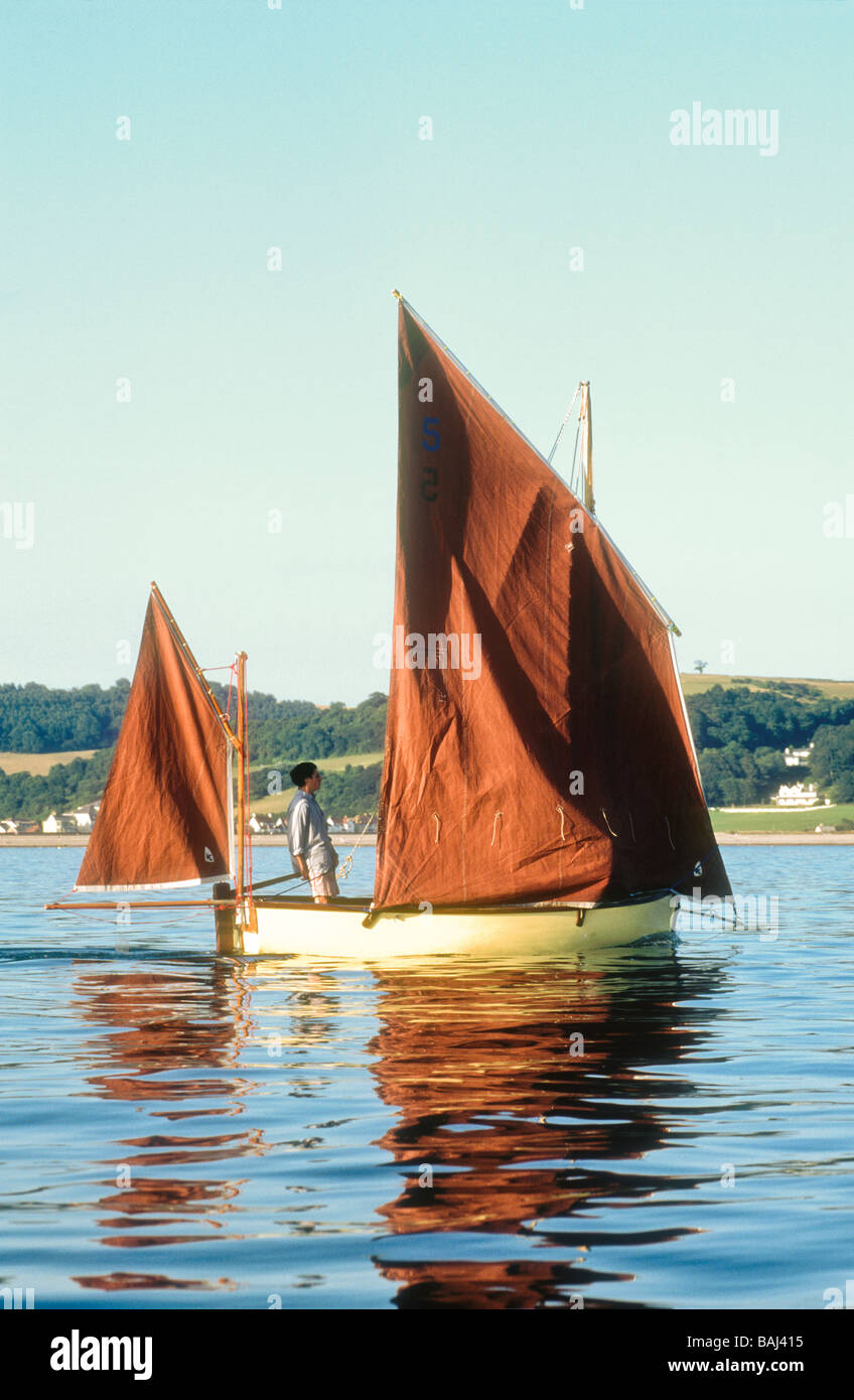 Sailing a Beer lugger boat off Beer village Devon England UK Europe ...