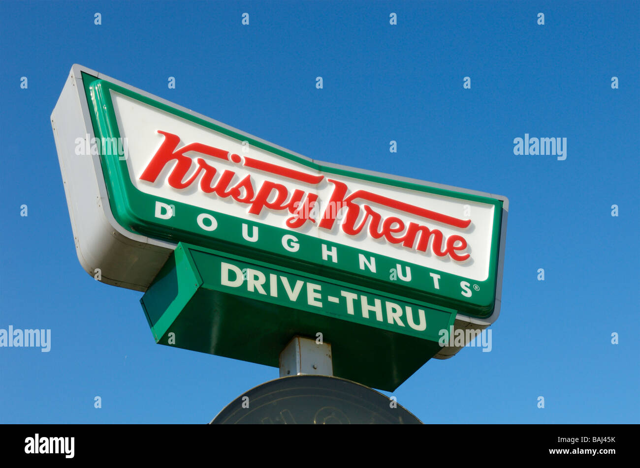 A Krispy Kreme doughnut drive in take away Stock Photo - Alamy