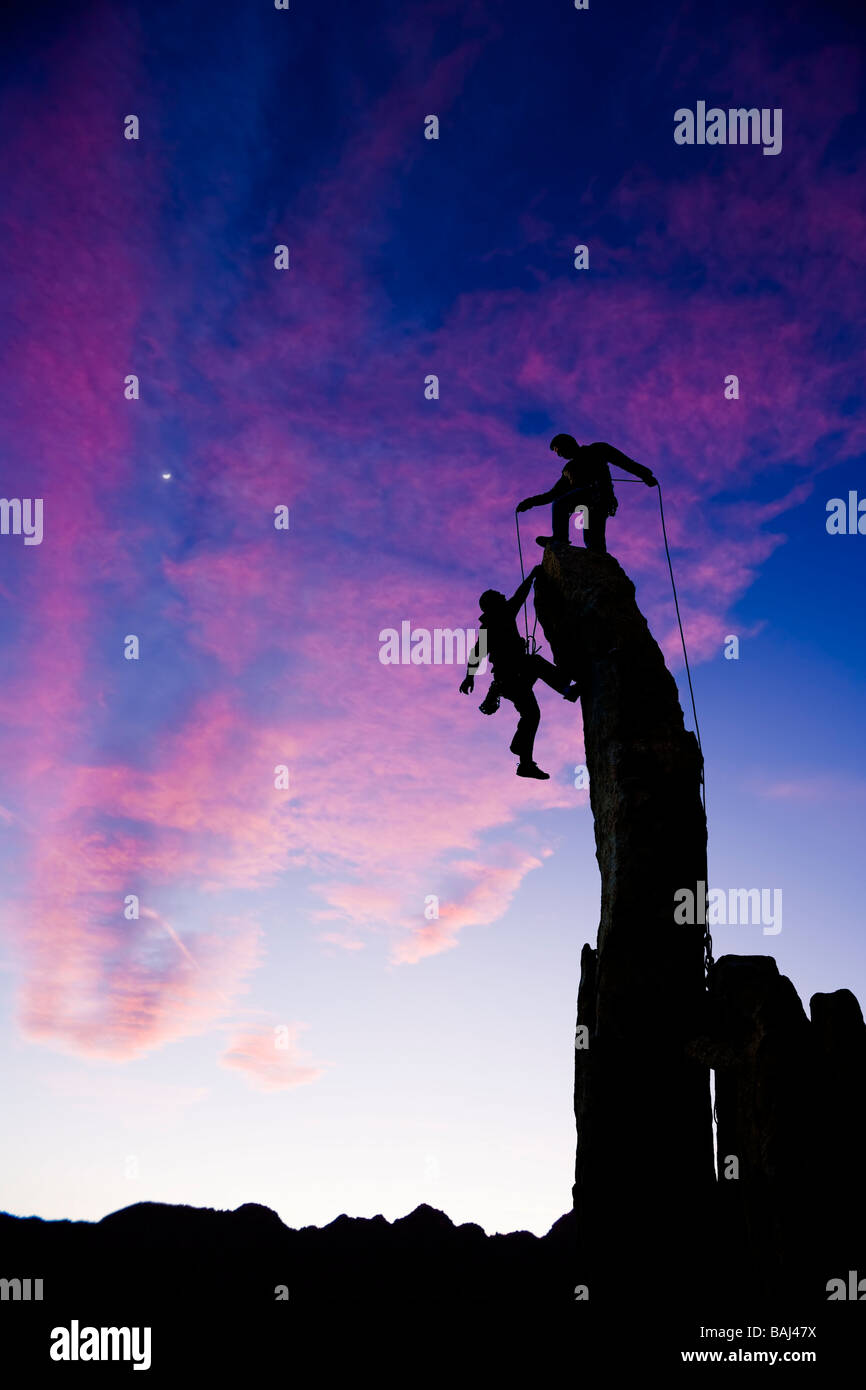 Climbers reaching a mountain top hi-res stock photography and images ...