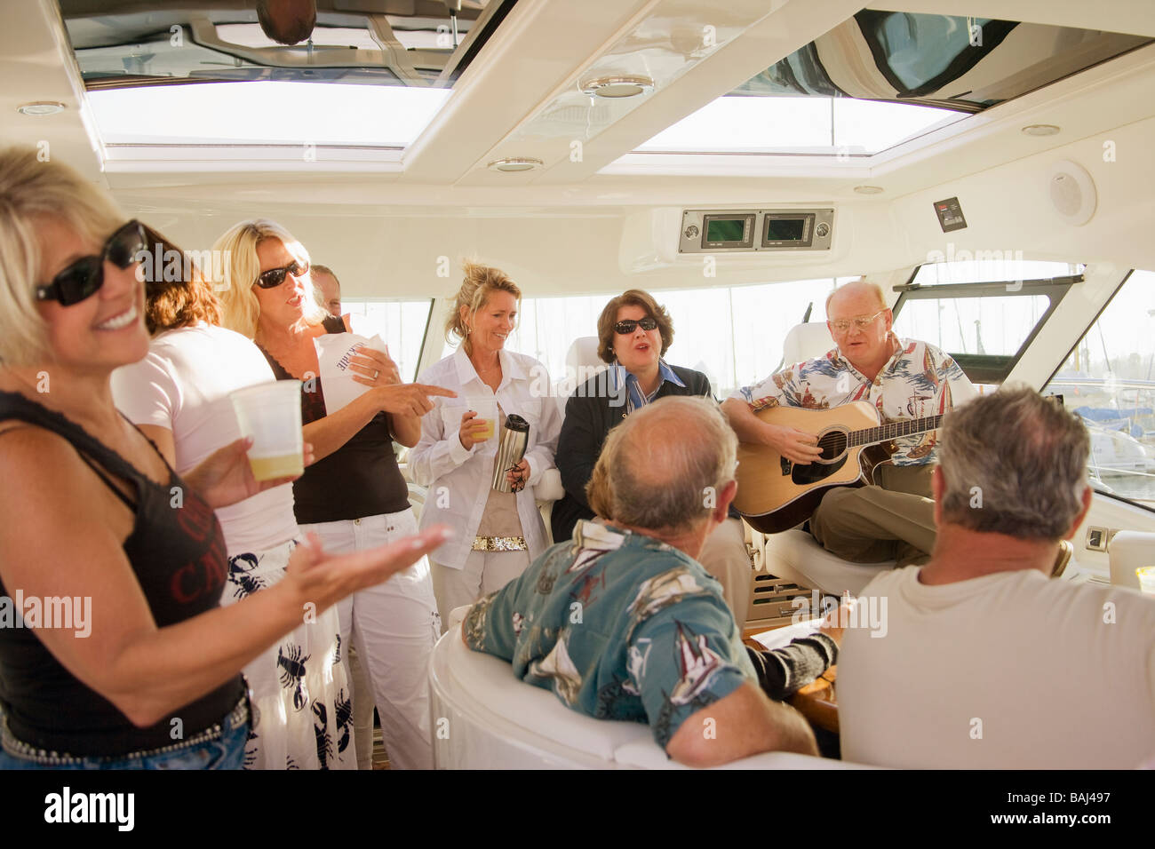 a party aboard a Sea Ray boat in Santa Barbara Harbor California United ...