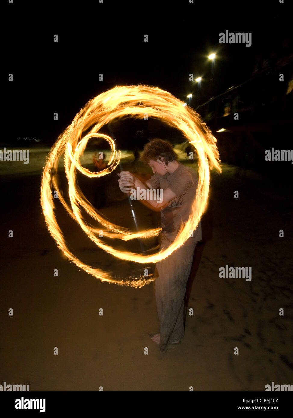 Fire dancer circle in a circle Stock Photo - Alamy