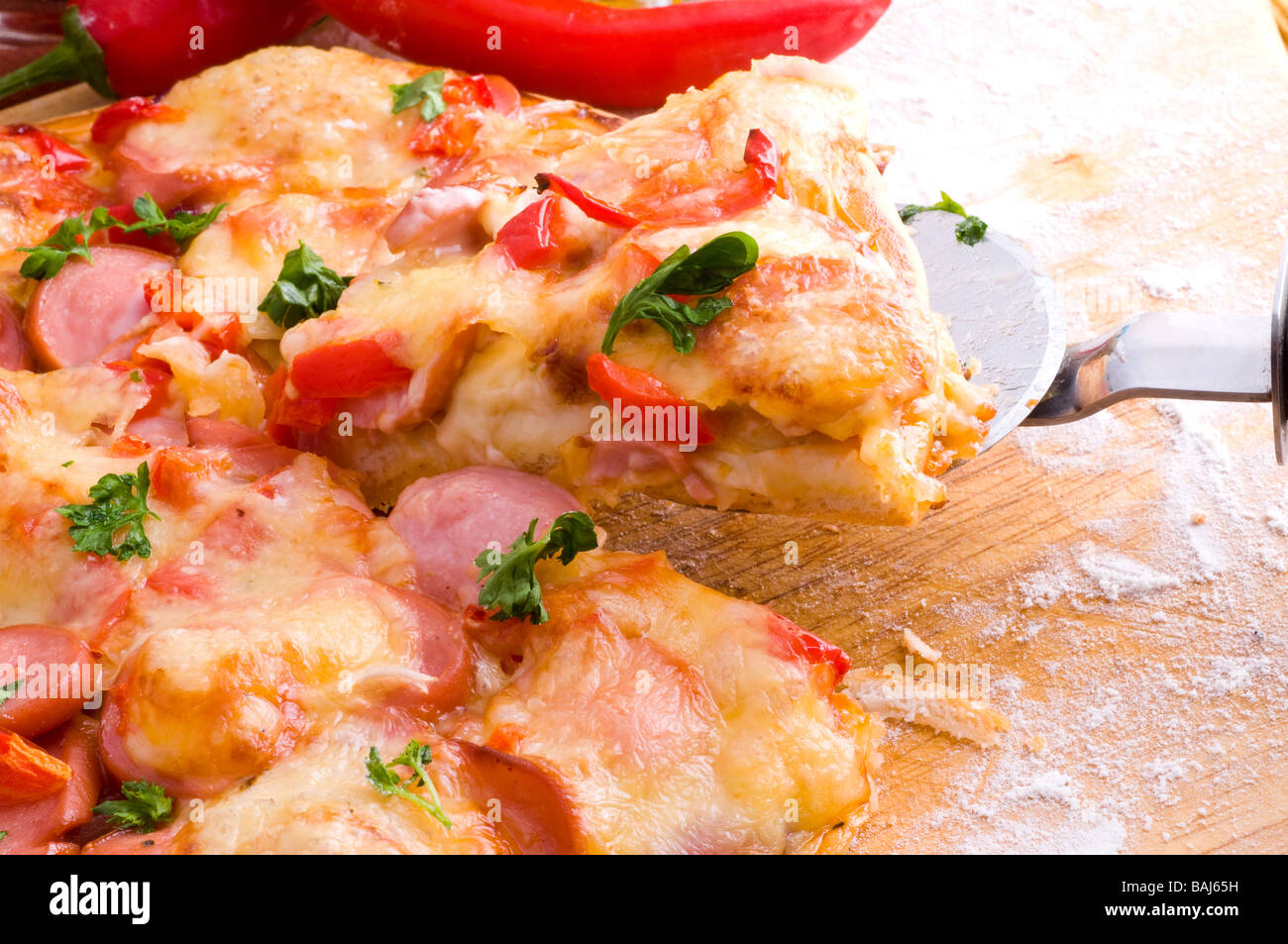 cheese and tomato pizza with rocket Stock Photo - Alamy