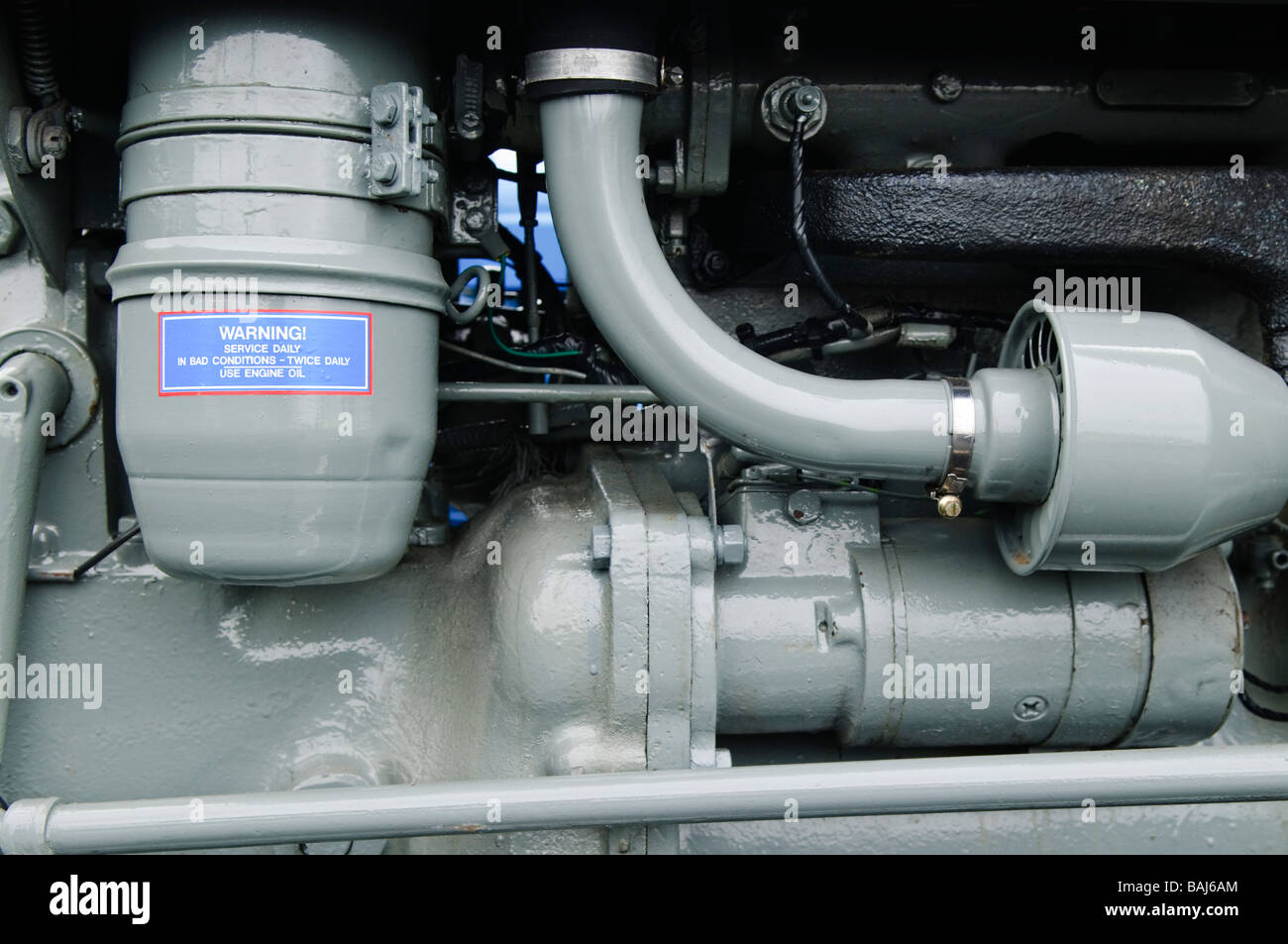 Side of a grey Massey Ferguson tractor Perkins Diesel engine Stock ...