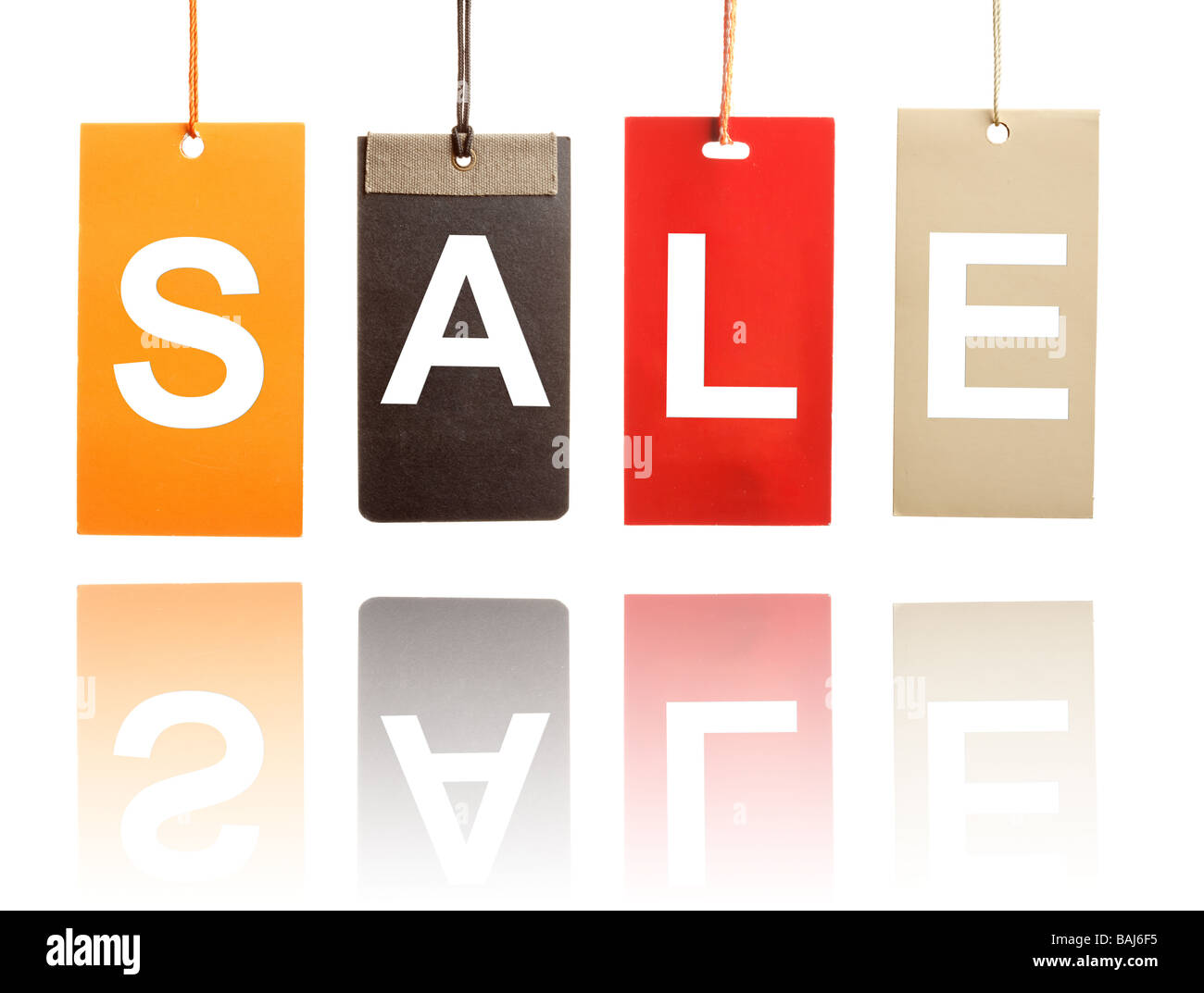Sale written on paper tags isolated on white background Stock Photo - Alamy
