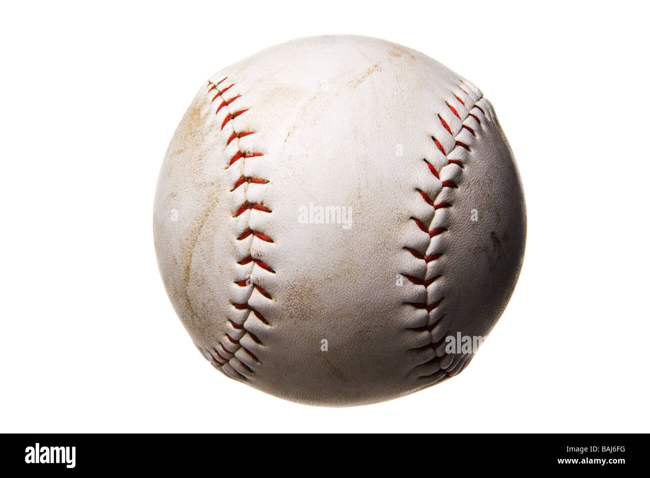 Used white softball isolated on white background. Top left front light ...