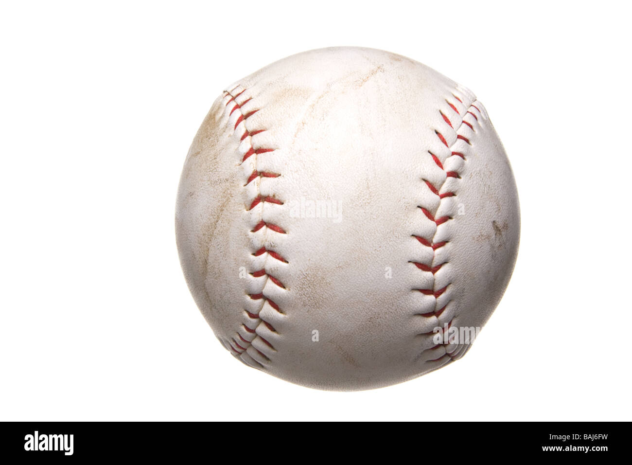 Used white softball isolated on white background. Top front light. Part ...