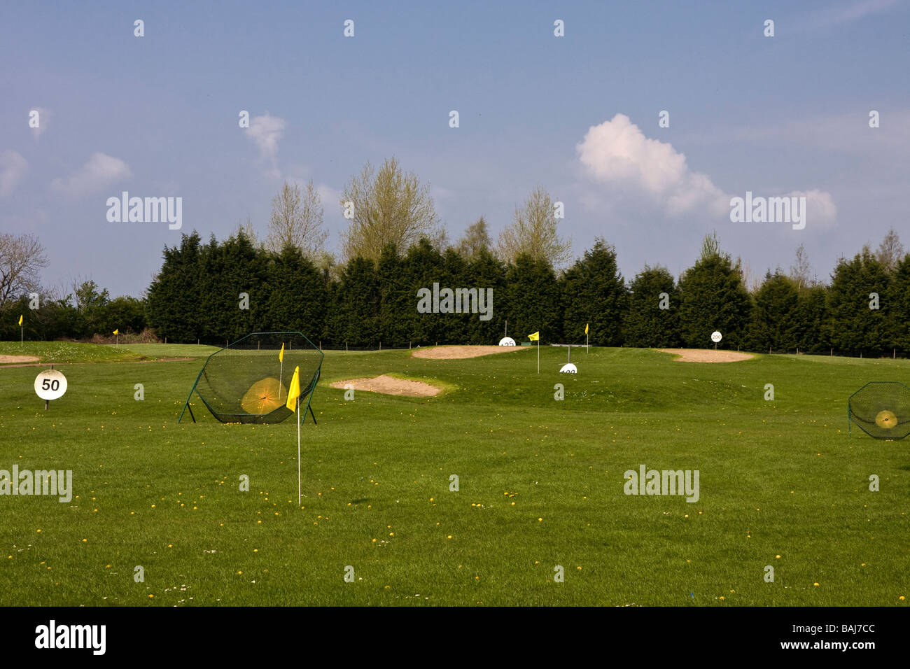 Golf driving range on a bright sunny day Stock Photo - Alamy