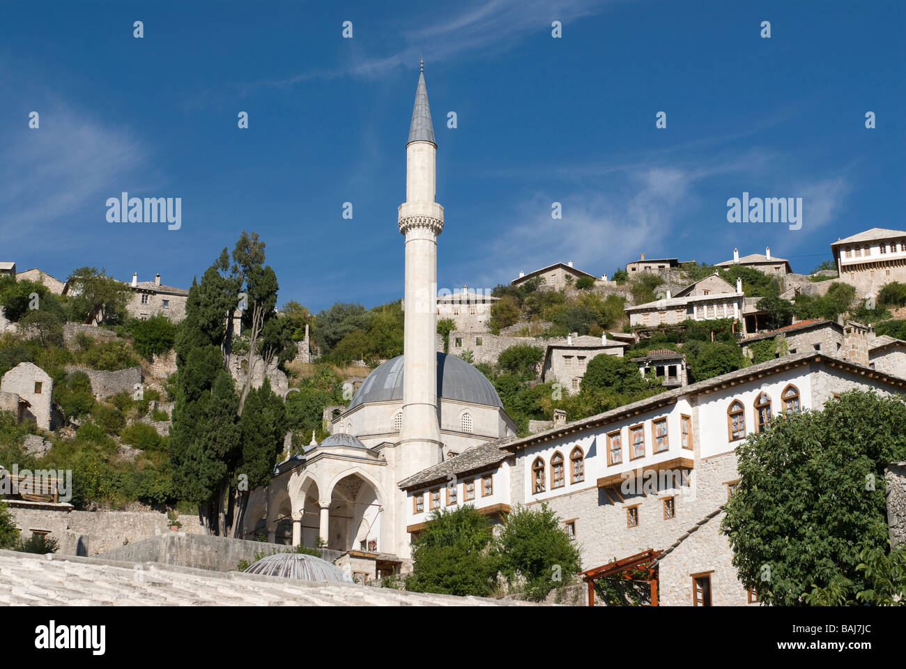City with minaret of mosque Pocitelj Bosnia Eastern Europe Stock Photo ...