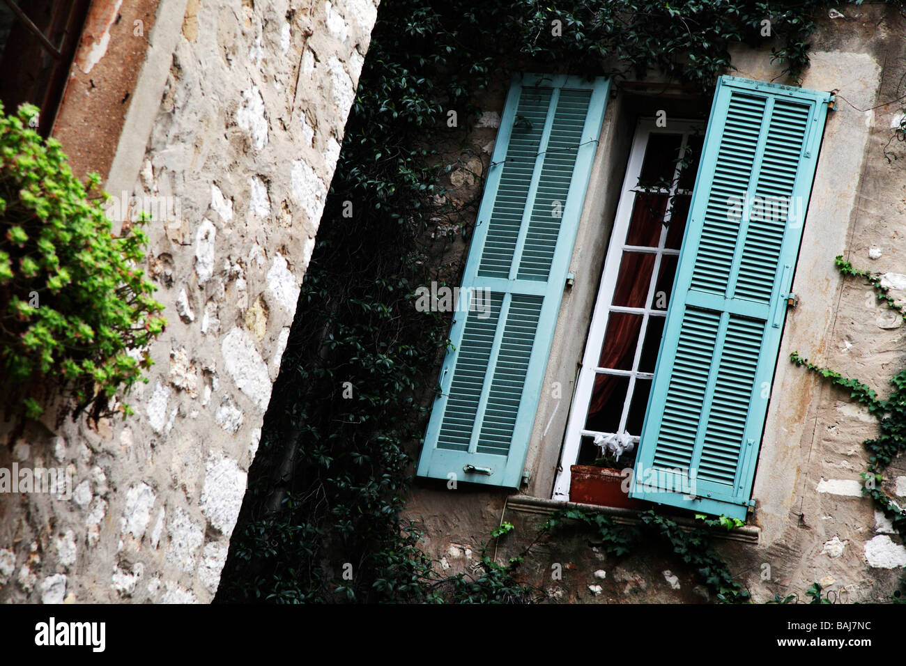 green shutter windows, south France Stock Photo - Alamy