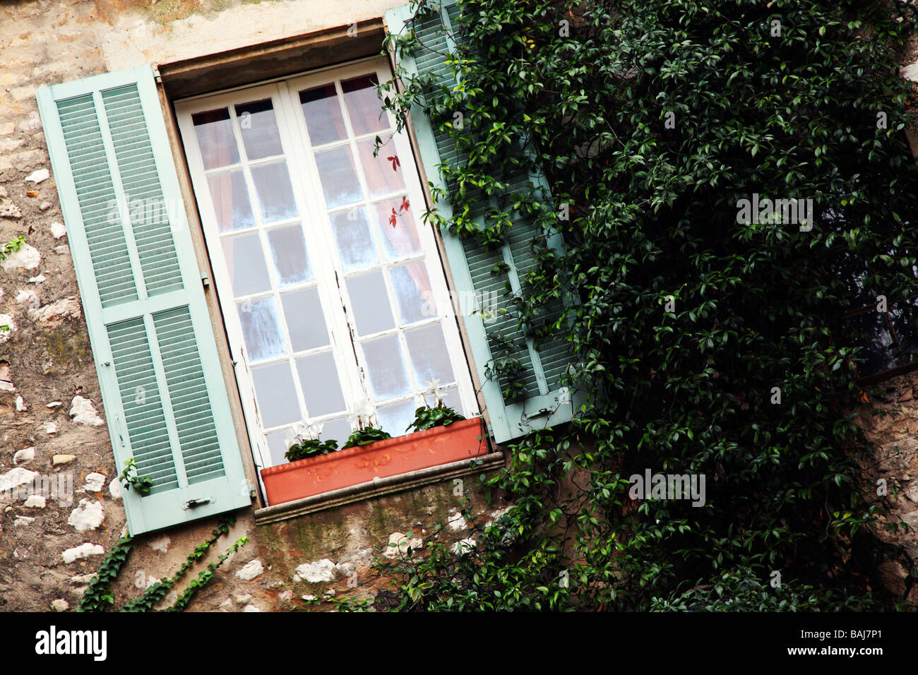 green shutter windows, south France Stock Photo - Alamy