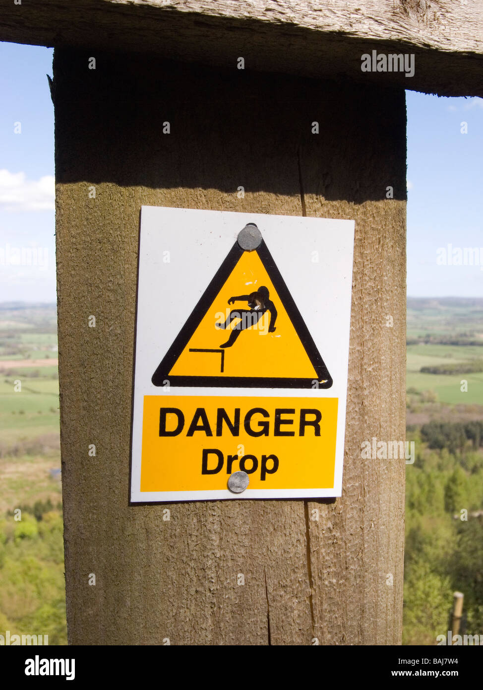 Warning notice Danger Drop on a steep hillside in North Yorkshire Stock ...