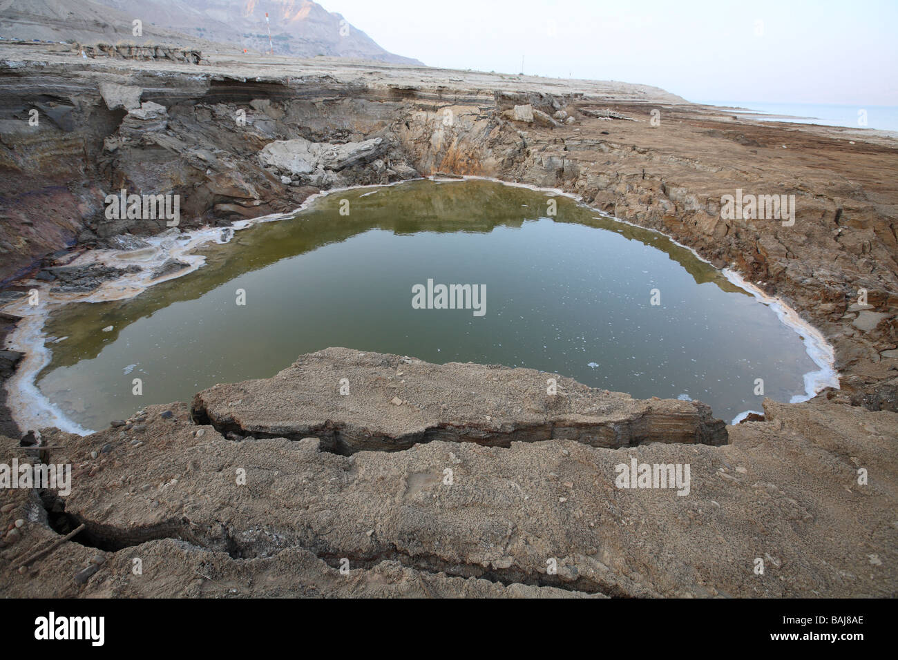 Israel Dead Sea Water pools in a sink hole on the shore of the Dead Sea ...