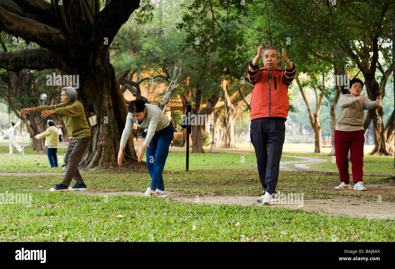 People Exercising In Park