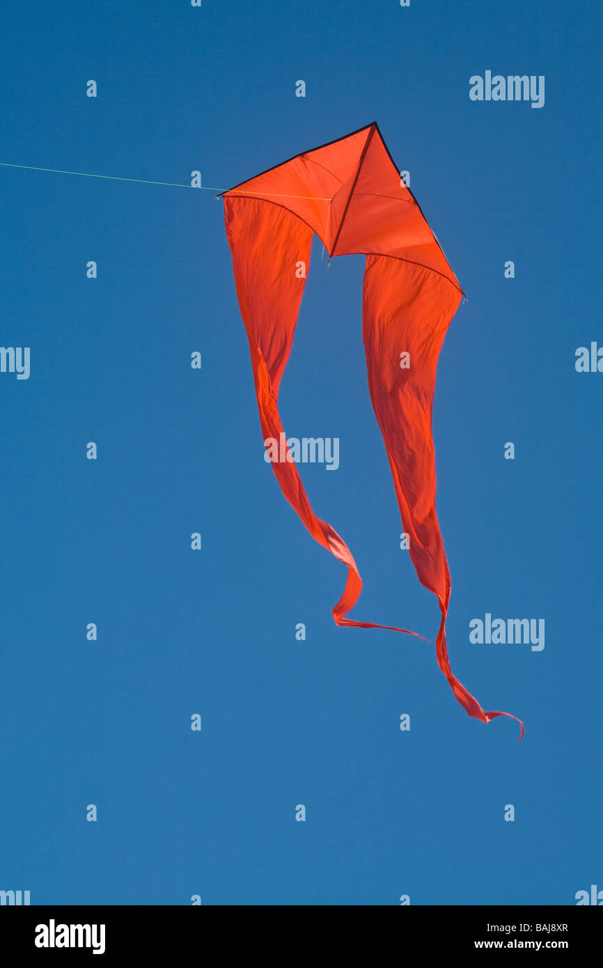 Kite Flying in blue sky Stock Photo - Alamy