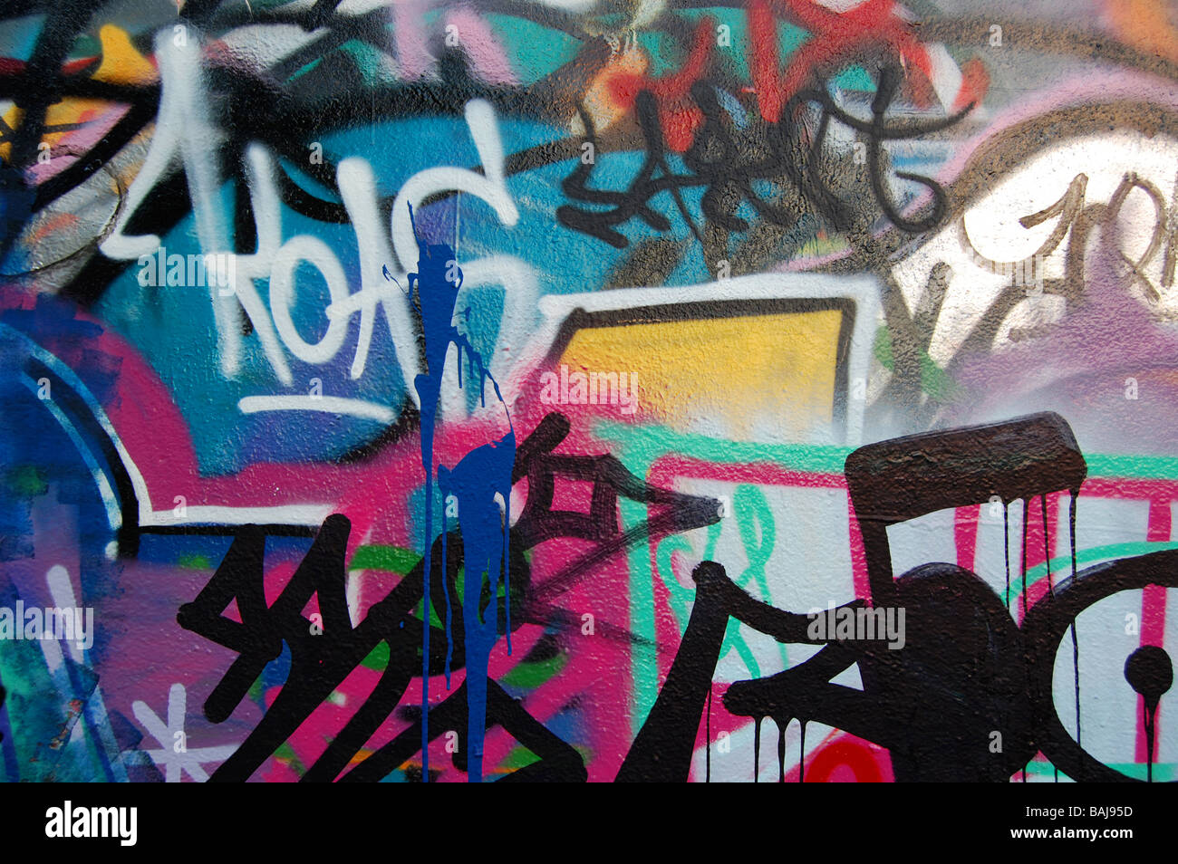 Wall covered with graffiti. Urban street art Stock Photo - Alamy