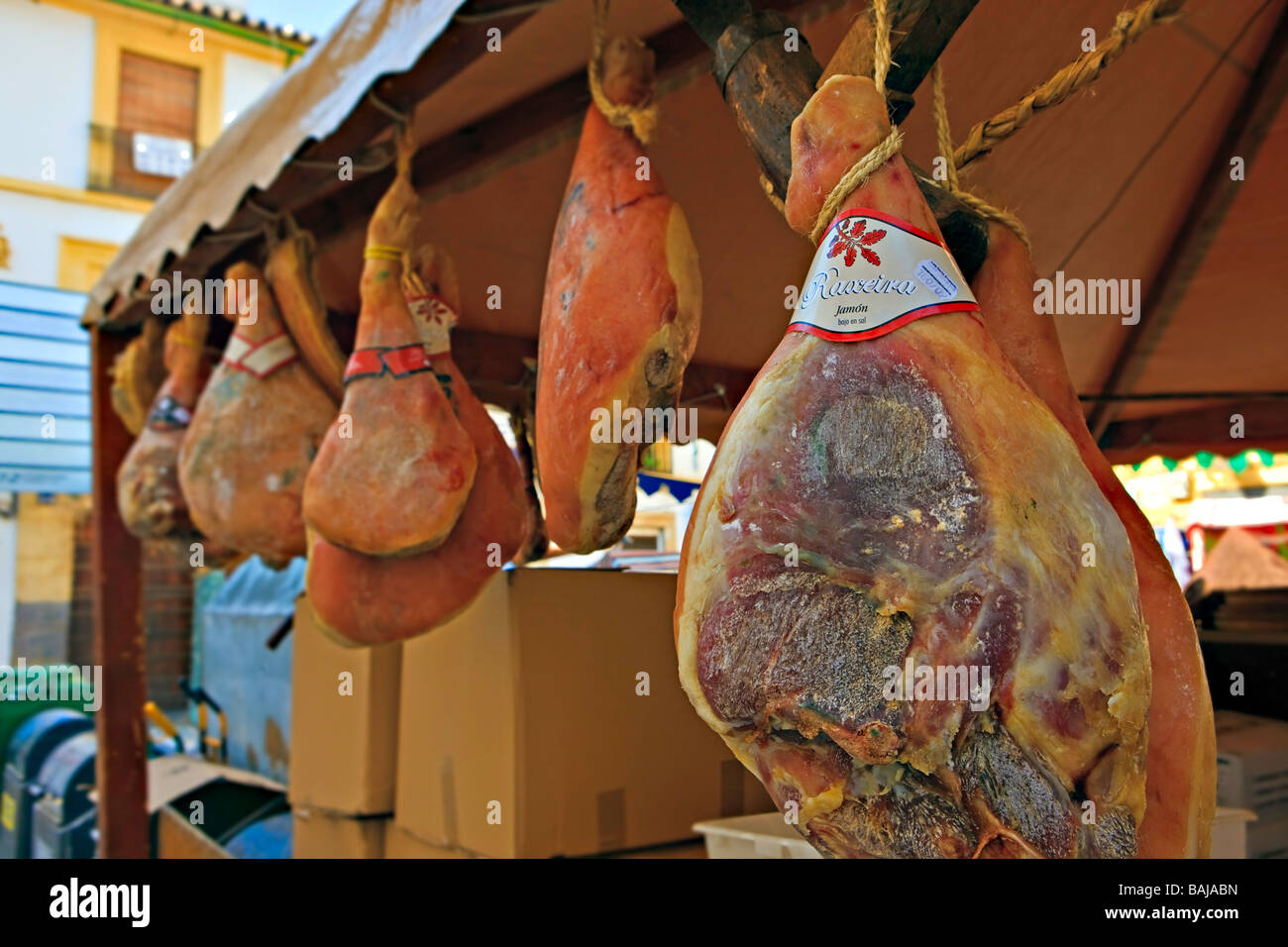 Hams hanging to dry at a market stall during a Medieval Festival in ...