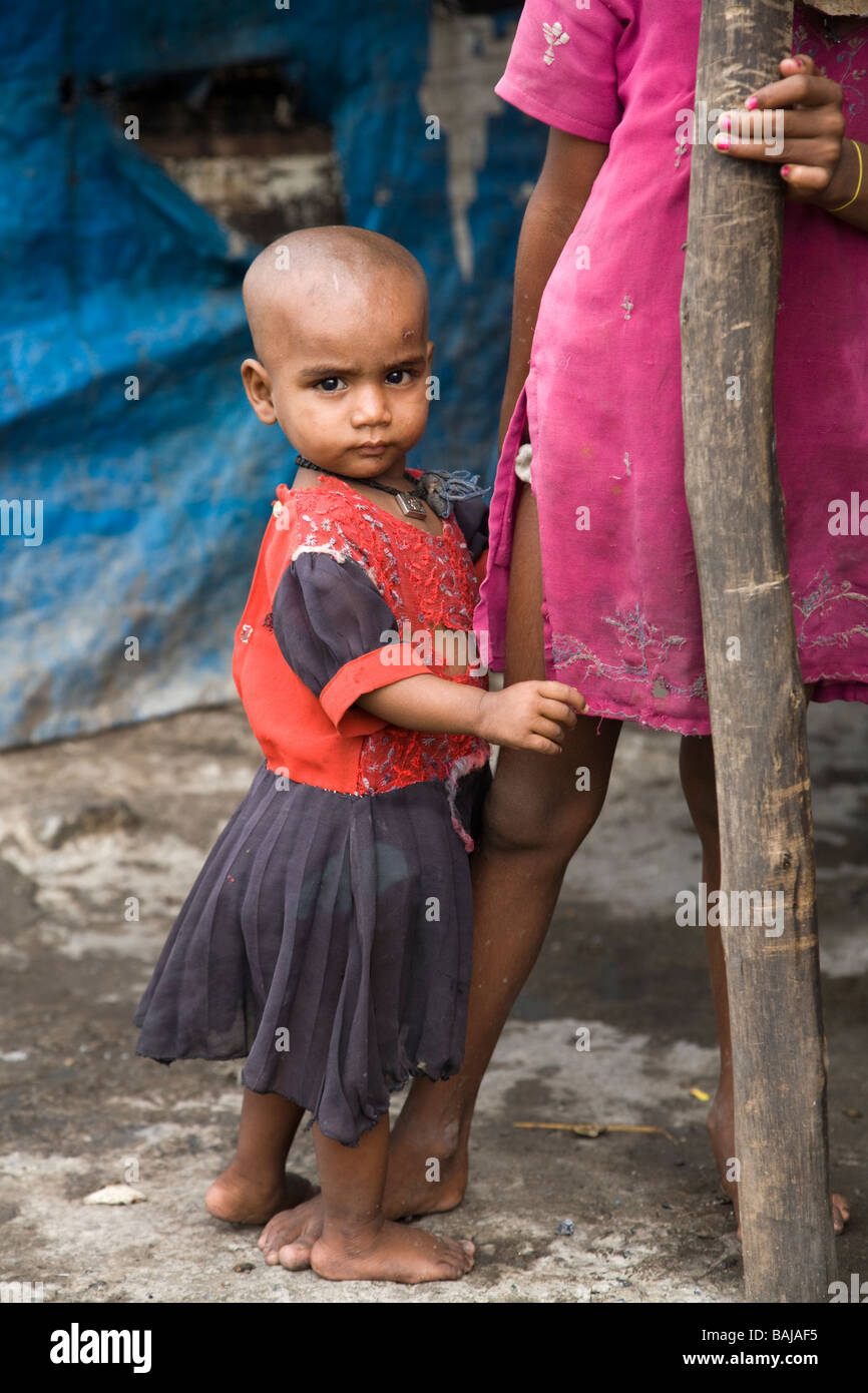 Two children in their slum village in Hazira, Surat, Gujarat. India ...