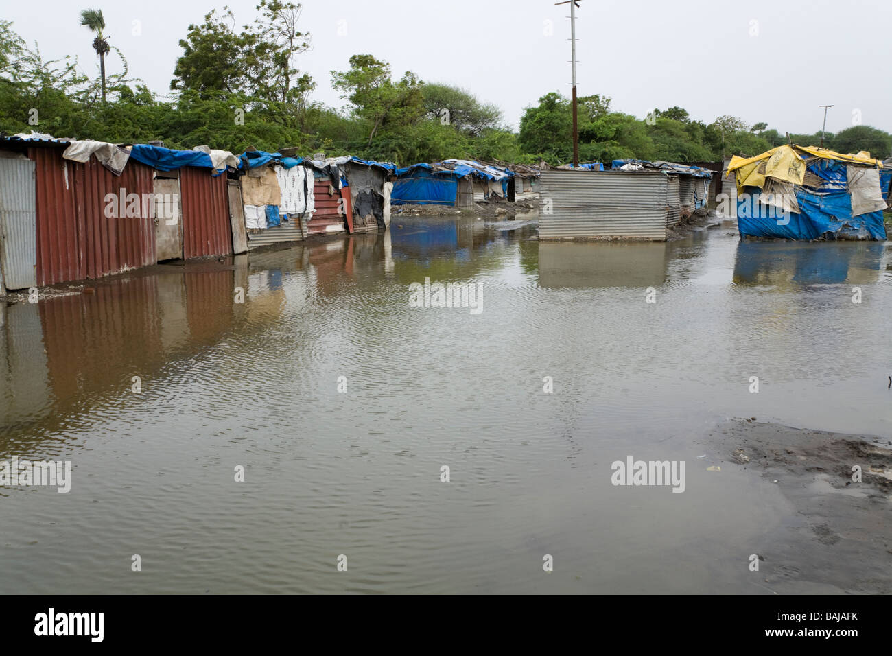 A slum village after rain, in Hazira, Surat, Gujarat. India Stock Photo ...