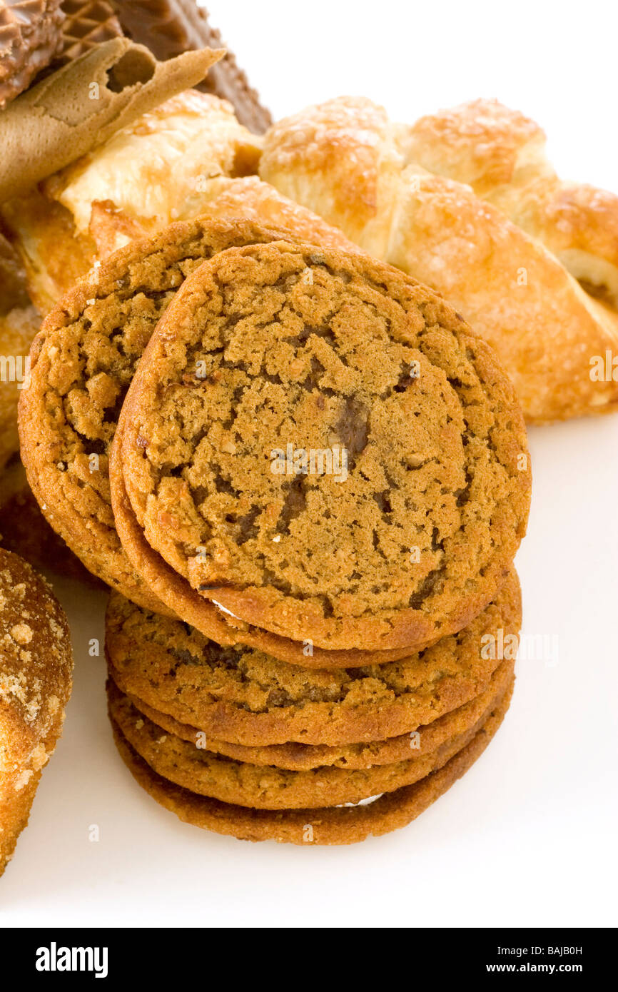Close up shot of stack of biscuits and sweet food in the background on ...