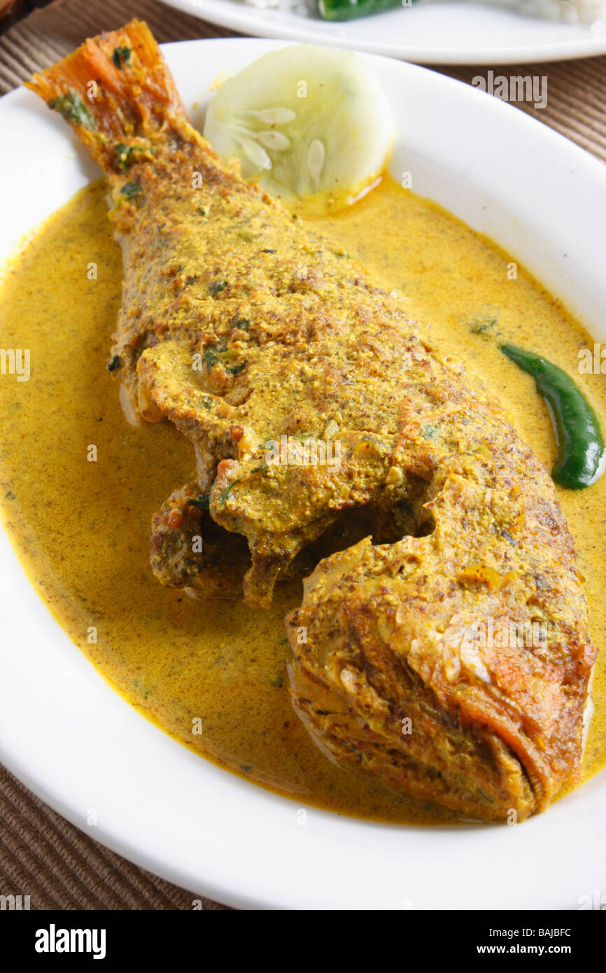 Maacher jhol is a traditional Bengali fish curry Stock Photo - Alamy