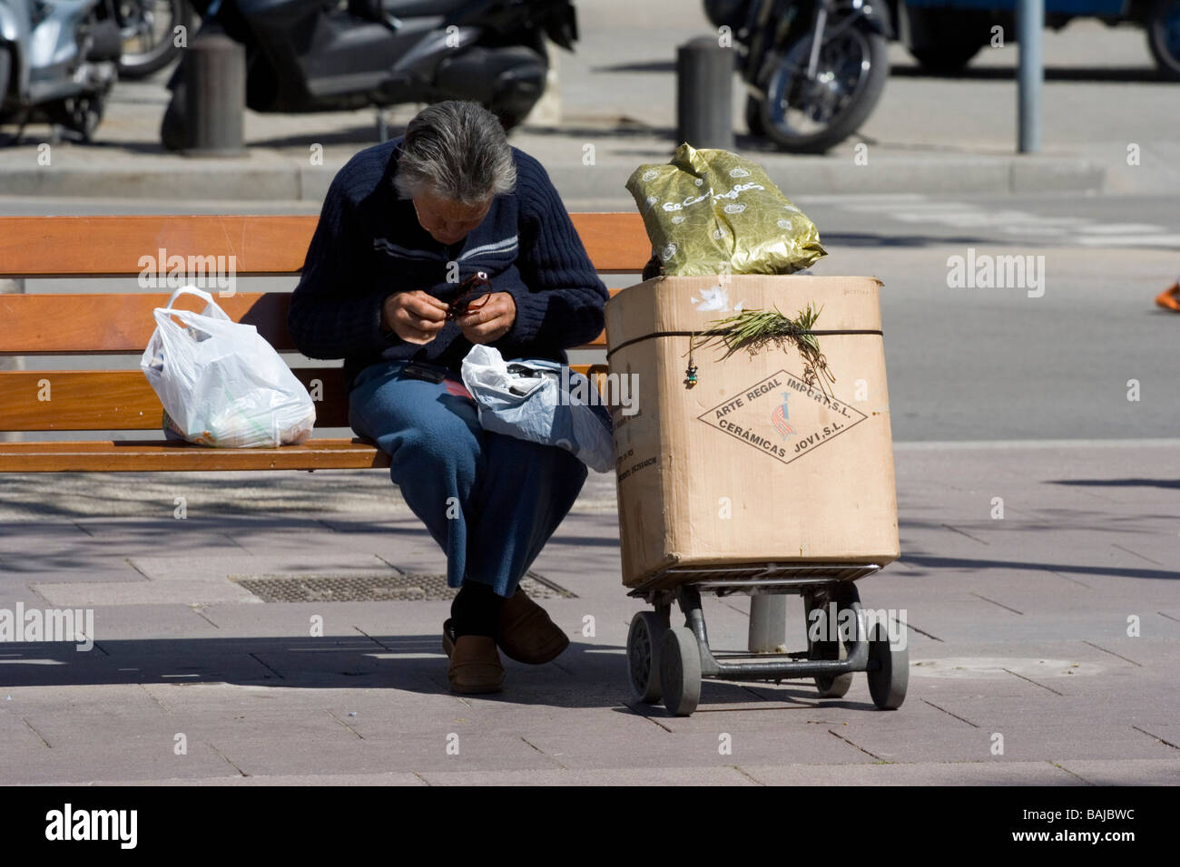 Homeless person with trolley hi-res stock photography and images - Alamy