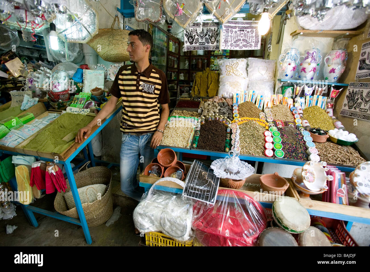 Market trader at El Heb Jebli at the Medina selling spices, baskets and ...