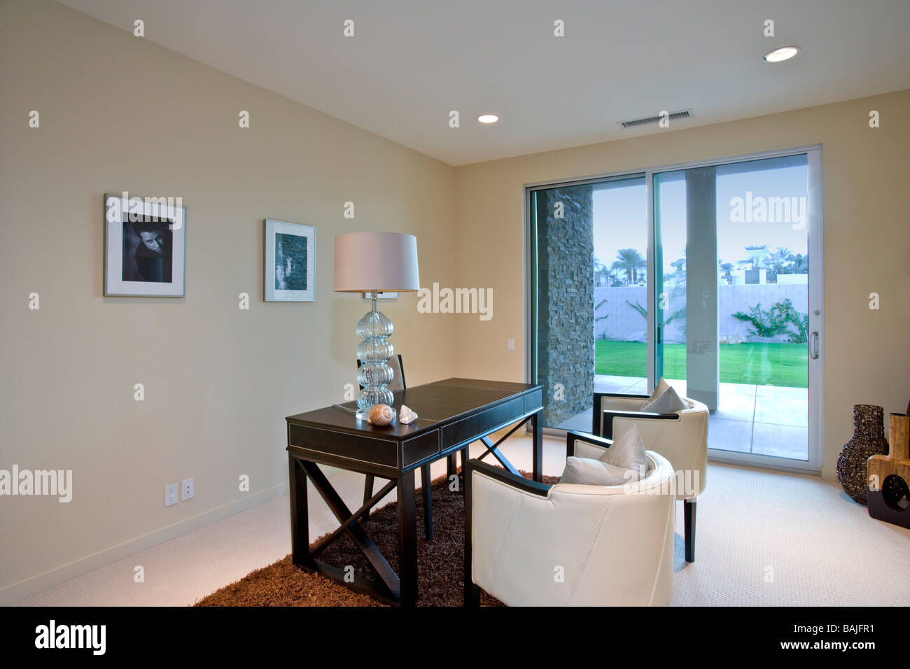 Modern house interior with desk and chairs Stock Photo - Alamy