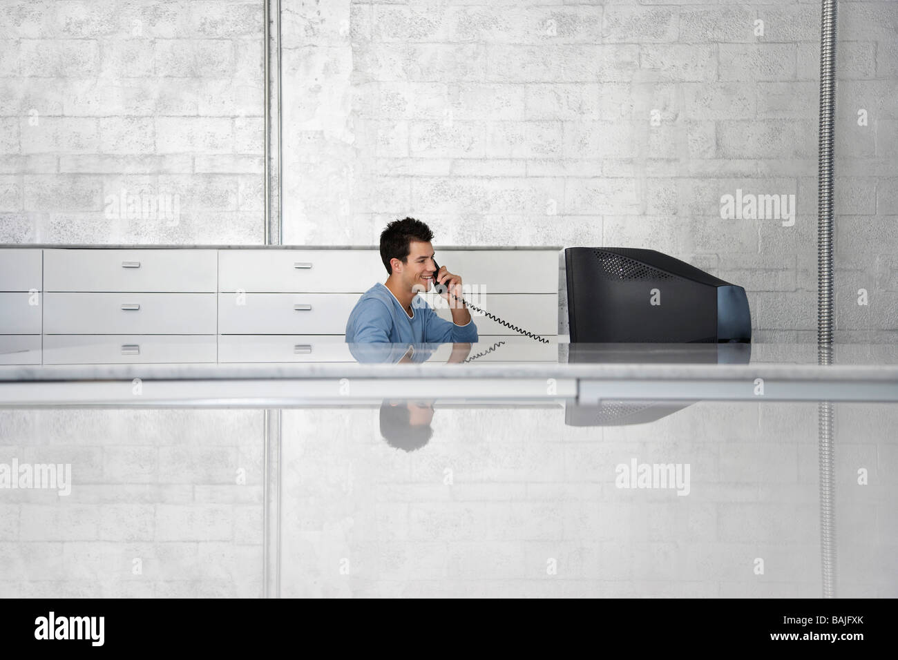 Man sitting in front of his tv set hi-res stock photography and images ...