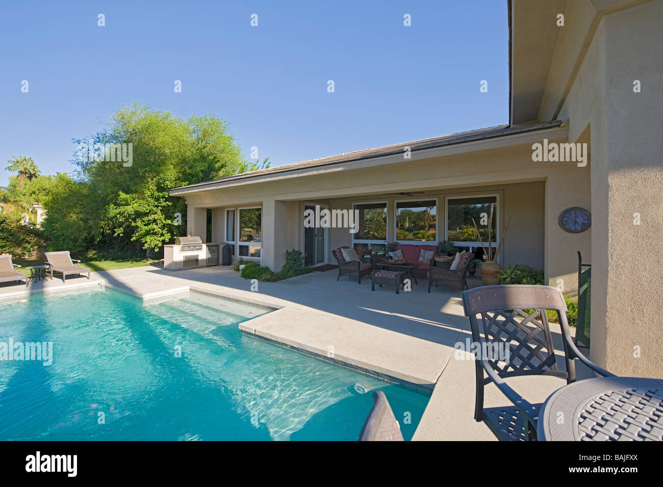 Swimming pool in backyard Stock Photo - Alamy