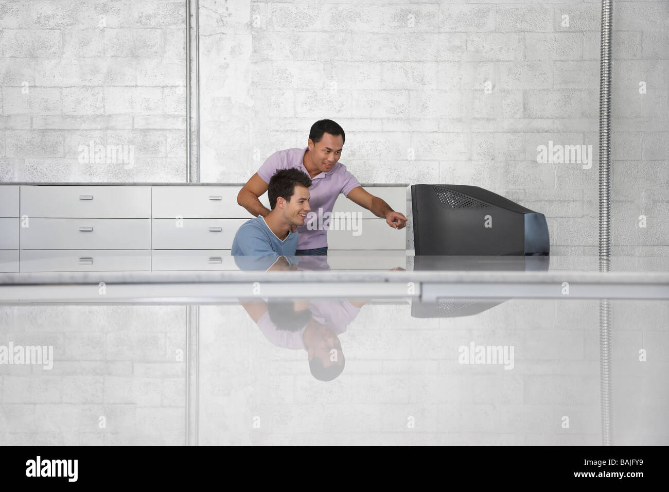 Man sitting in front of his tv set hi-res stock photography and images ...