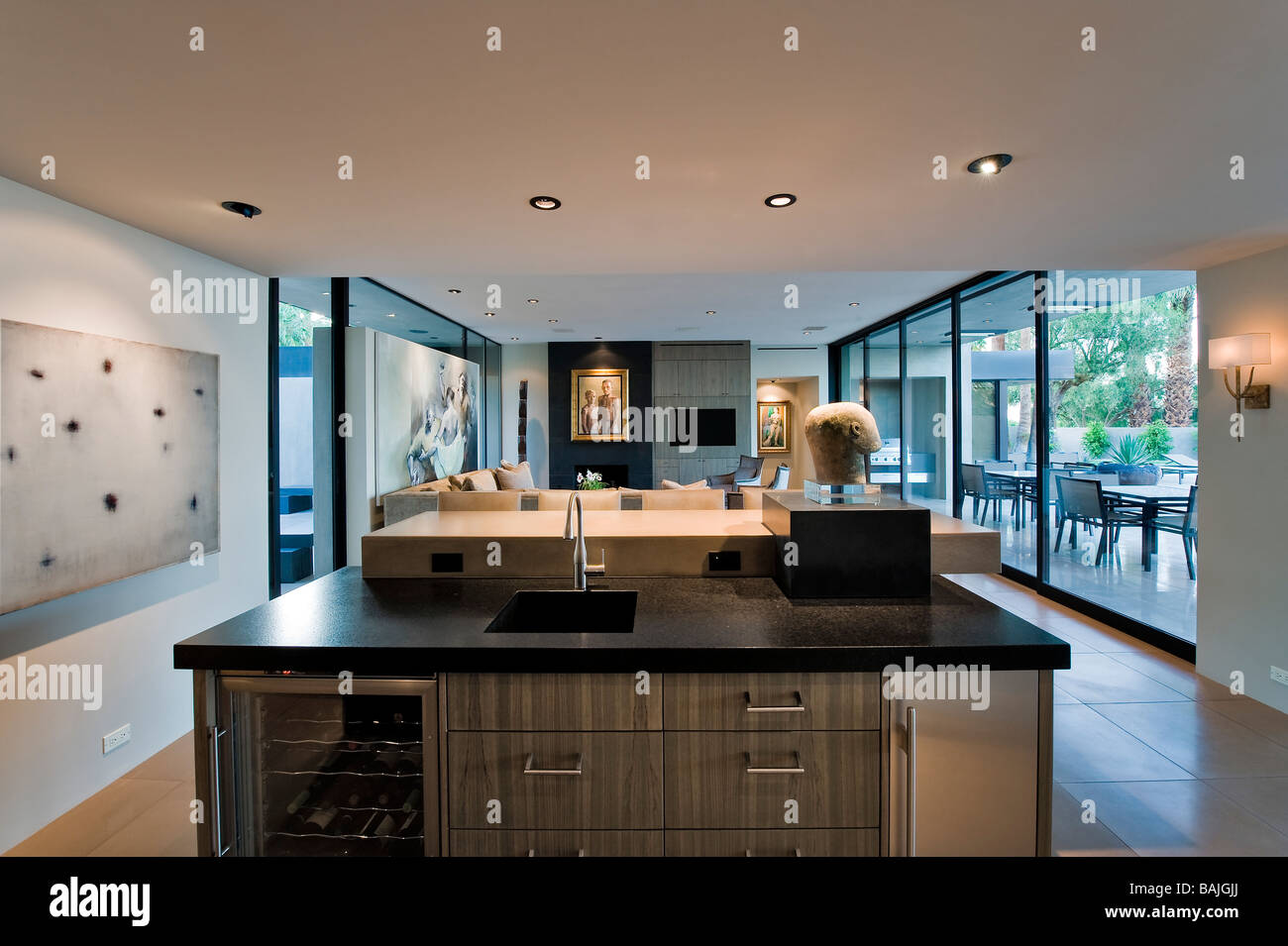 Modern kitchen with view of patio Stock Photo - Alamy