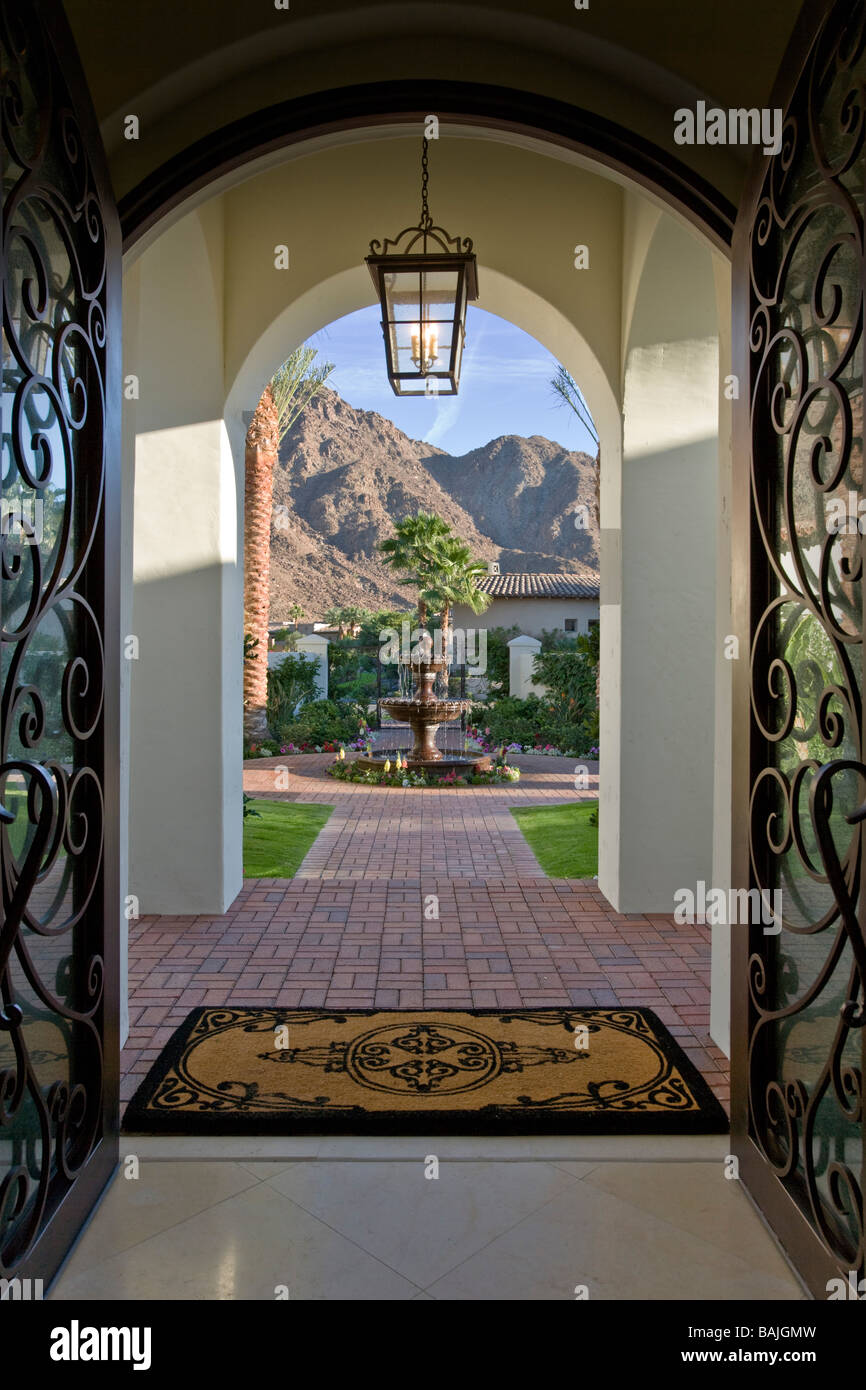 Entrance hall in elegant house, door opened Stock Photo - Alamy