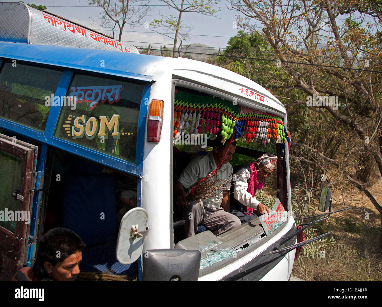 Bus, Coach in accident with broken windscreen on road in Nepal ...