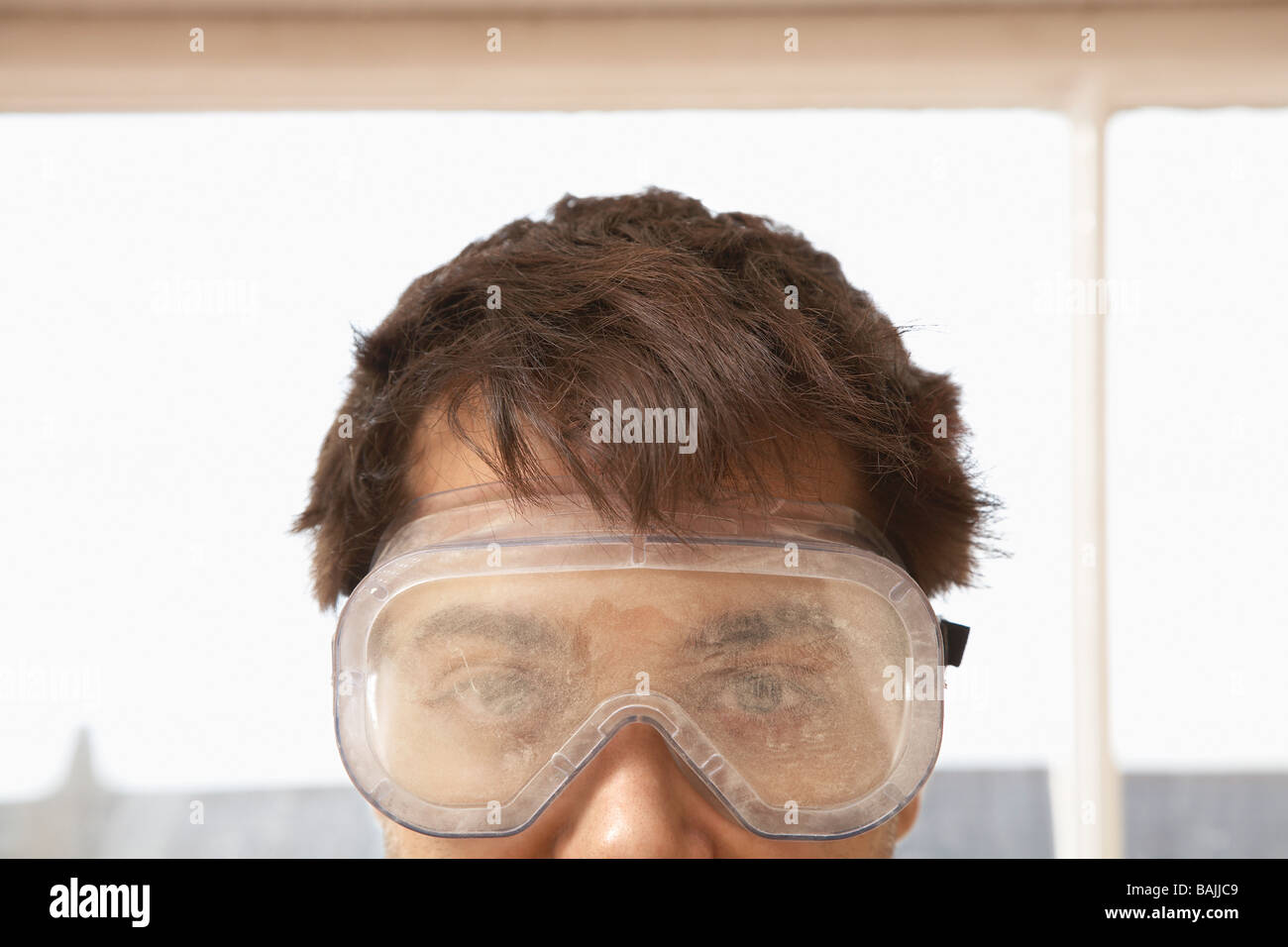 Man Wearing Safety Goggles High Resolution Stock Photography and Images ...